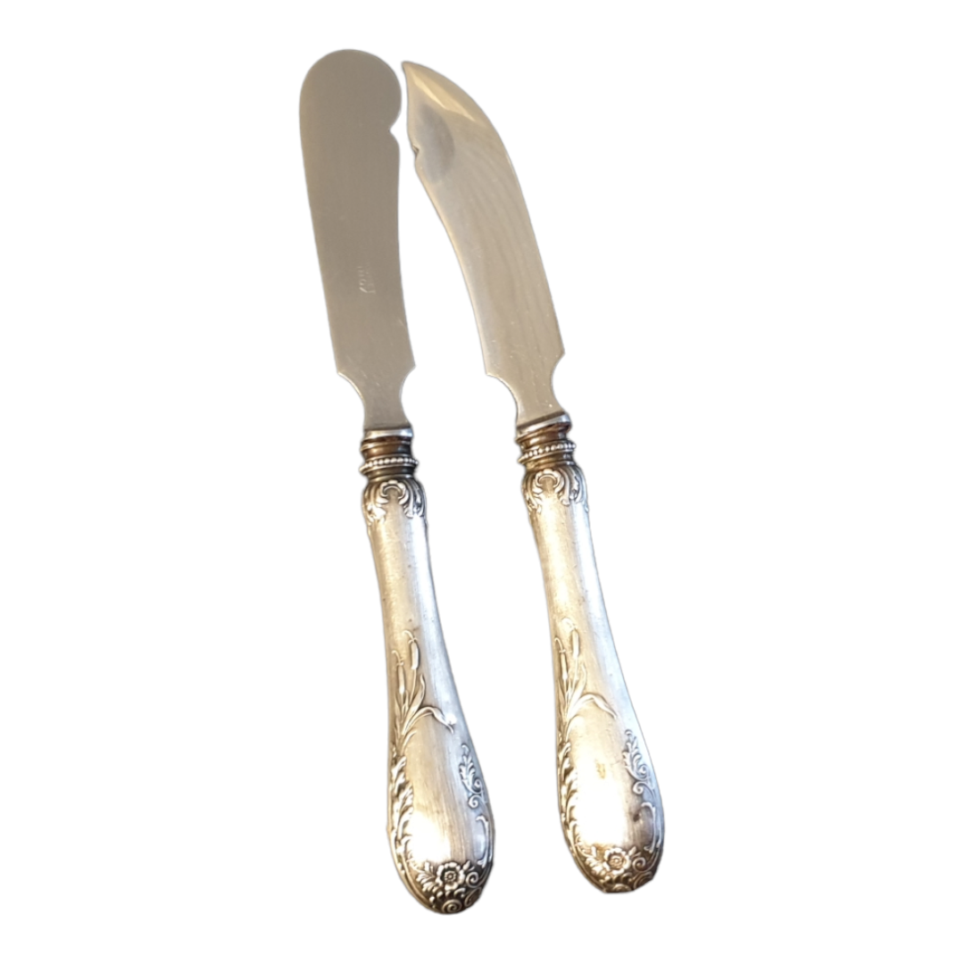 Couverts argentés à beure et fromage